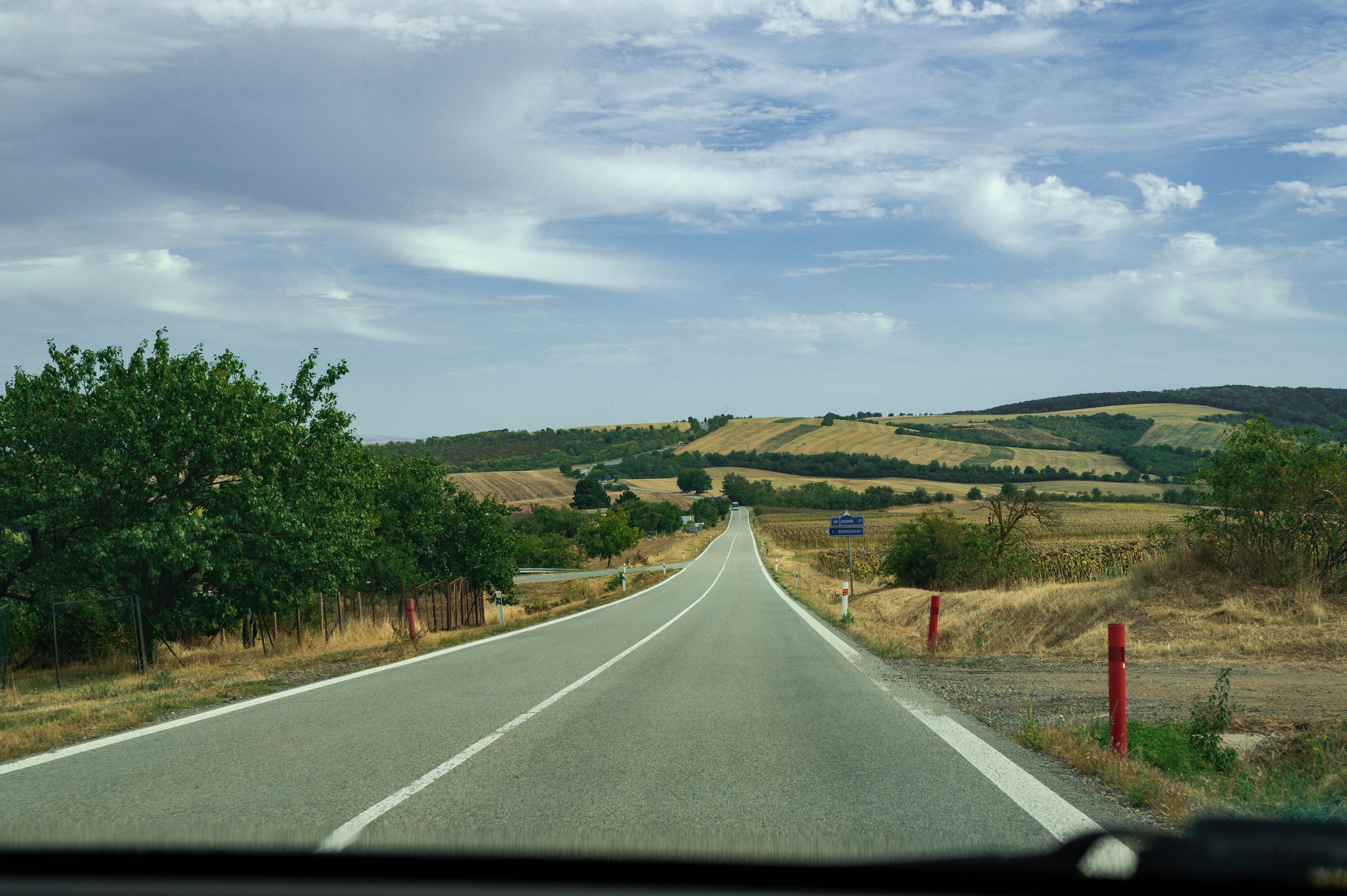 Long Road to the Horizon: Countryside Afloat Under Wide Skies