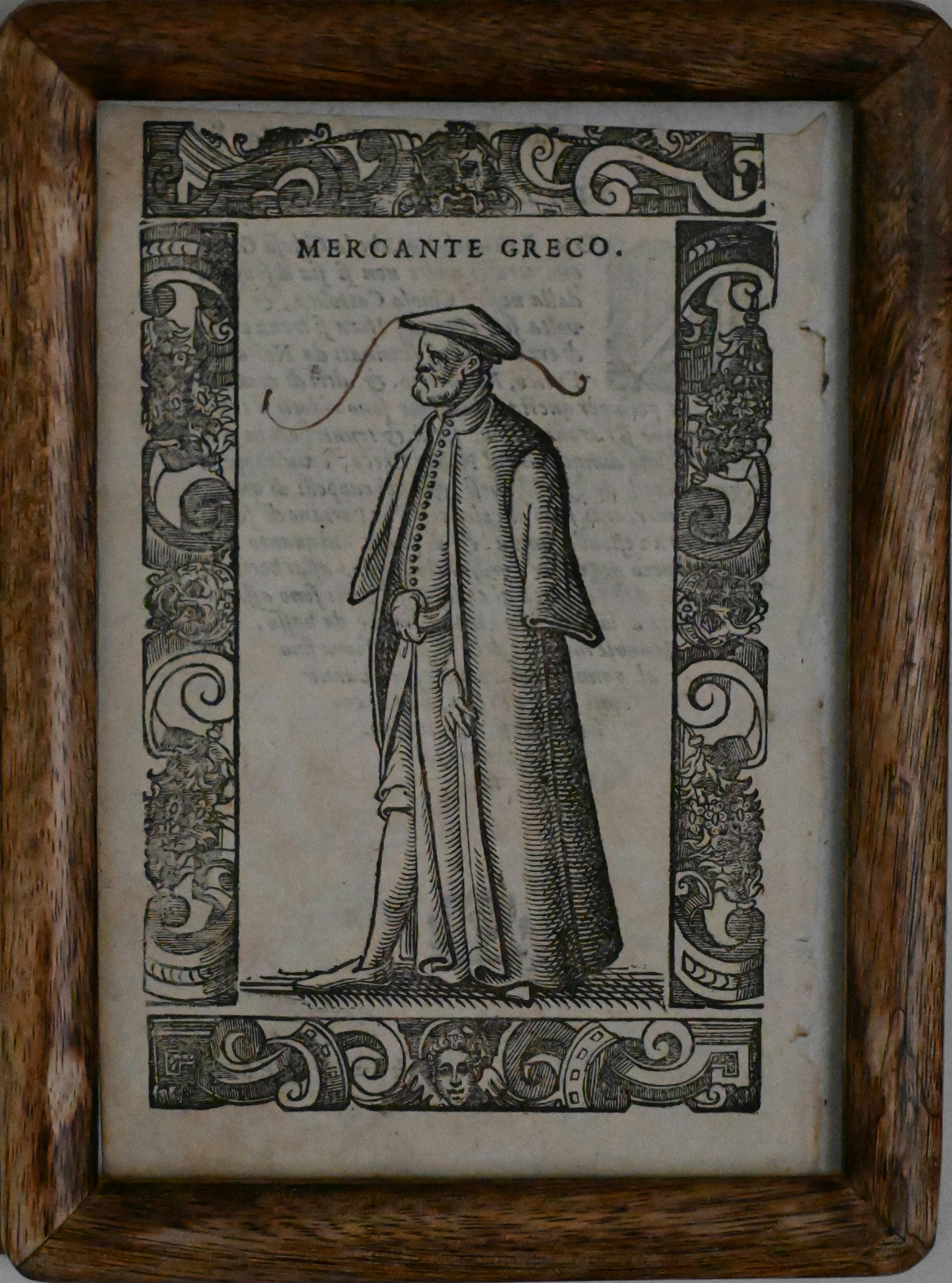 Mercantile Portrait: A 17th-Century Robed Figure Framed in Ornate Borders