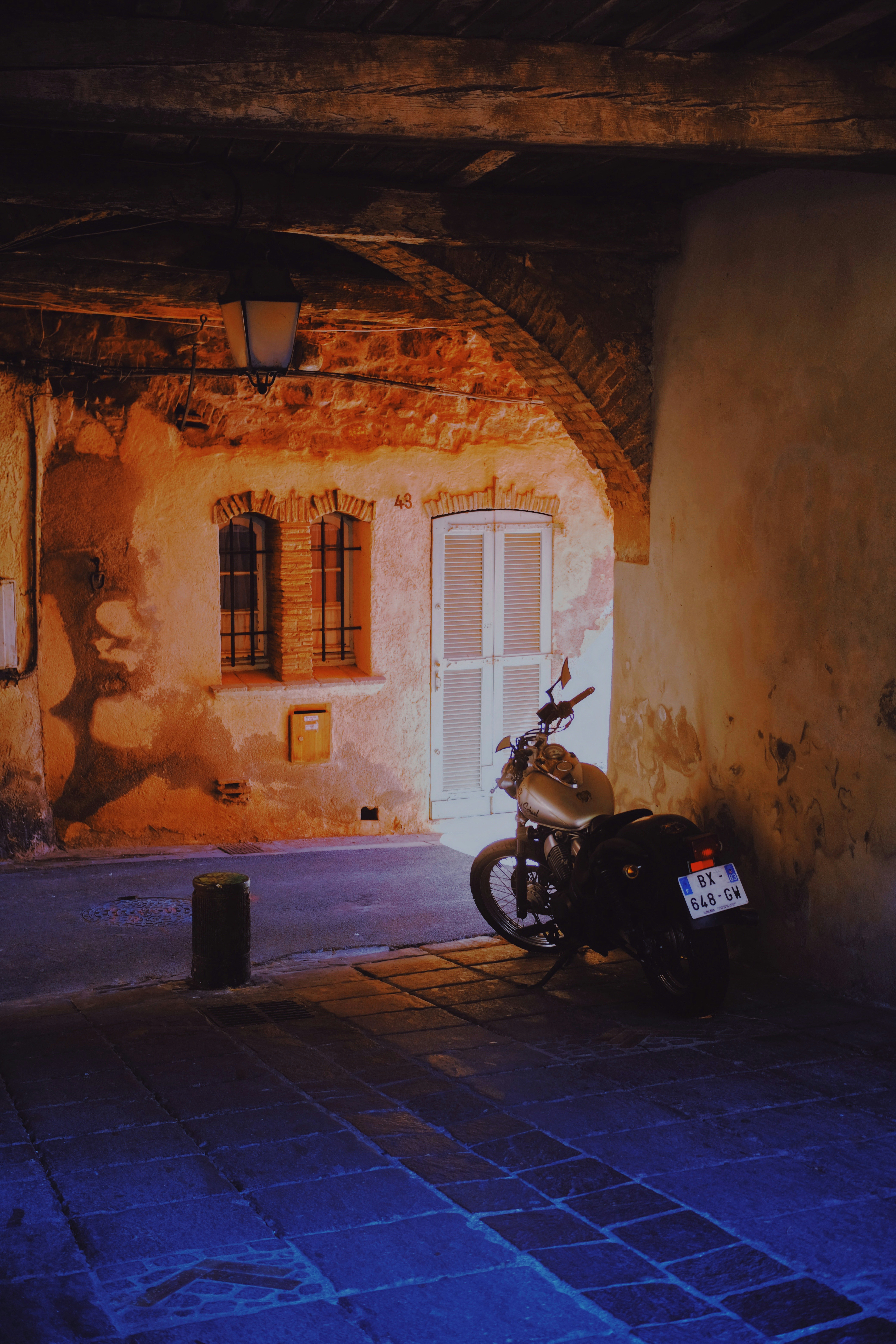 Street-side Neon Glow on a Quiet Italian Corner