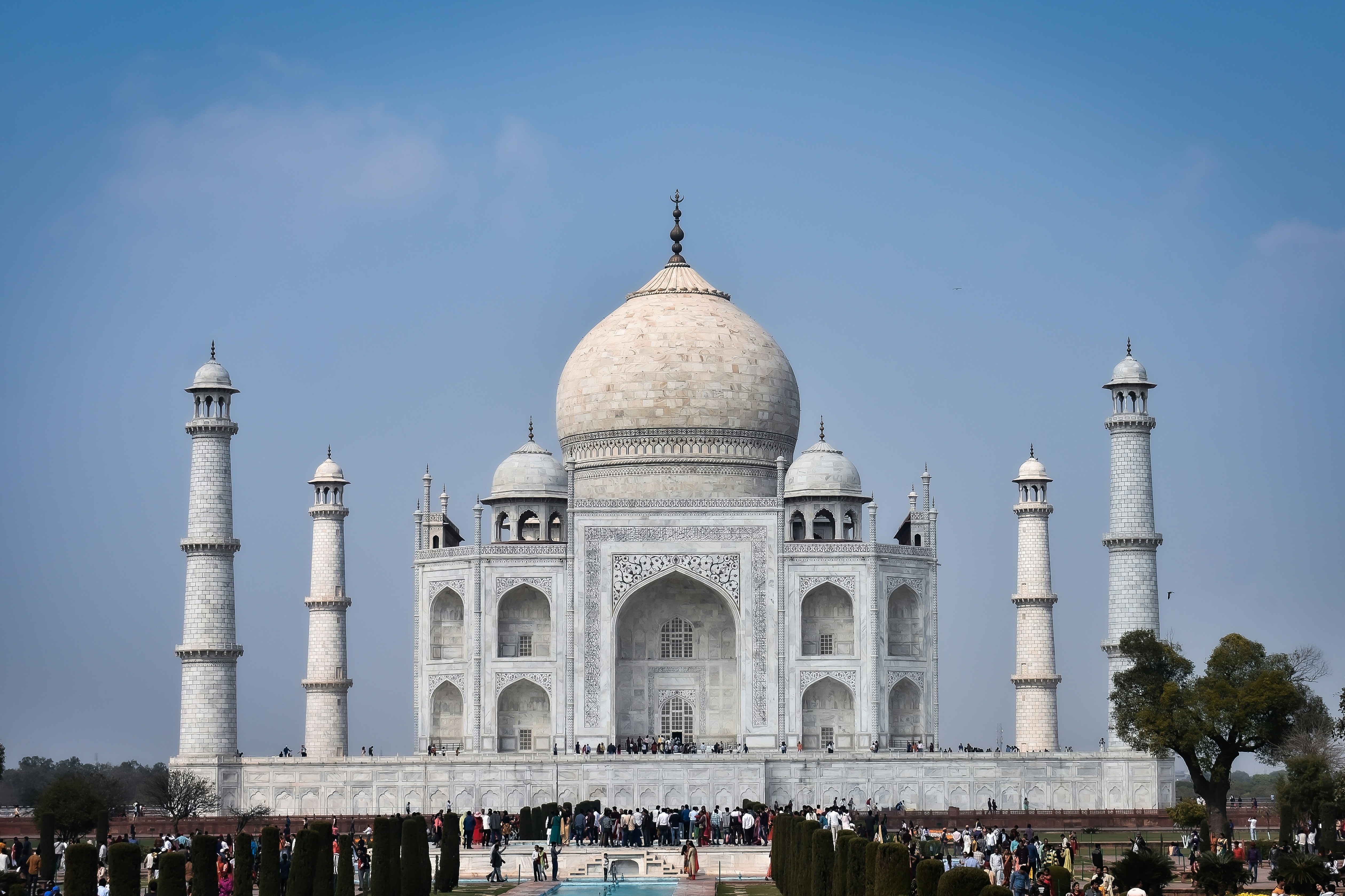 Taj Mahal in Bright Morning Light: Marble Icon at the End of the Reflective Pool