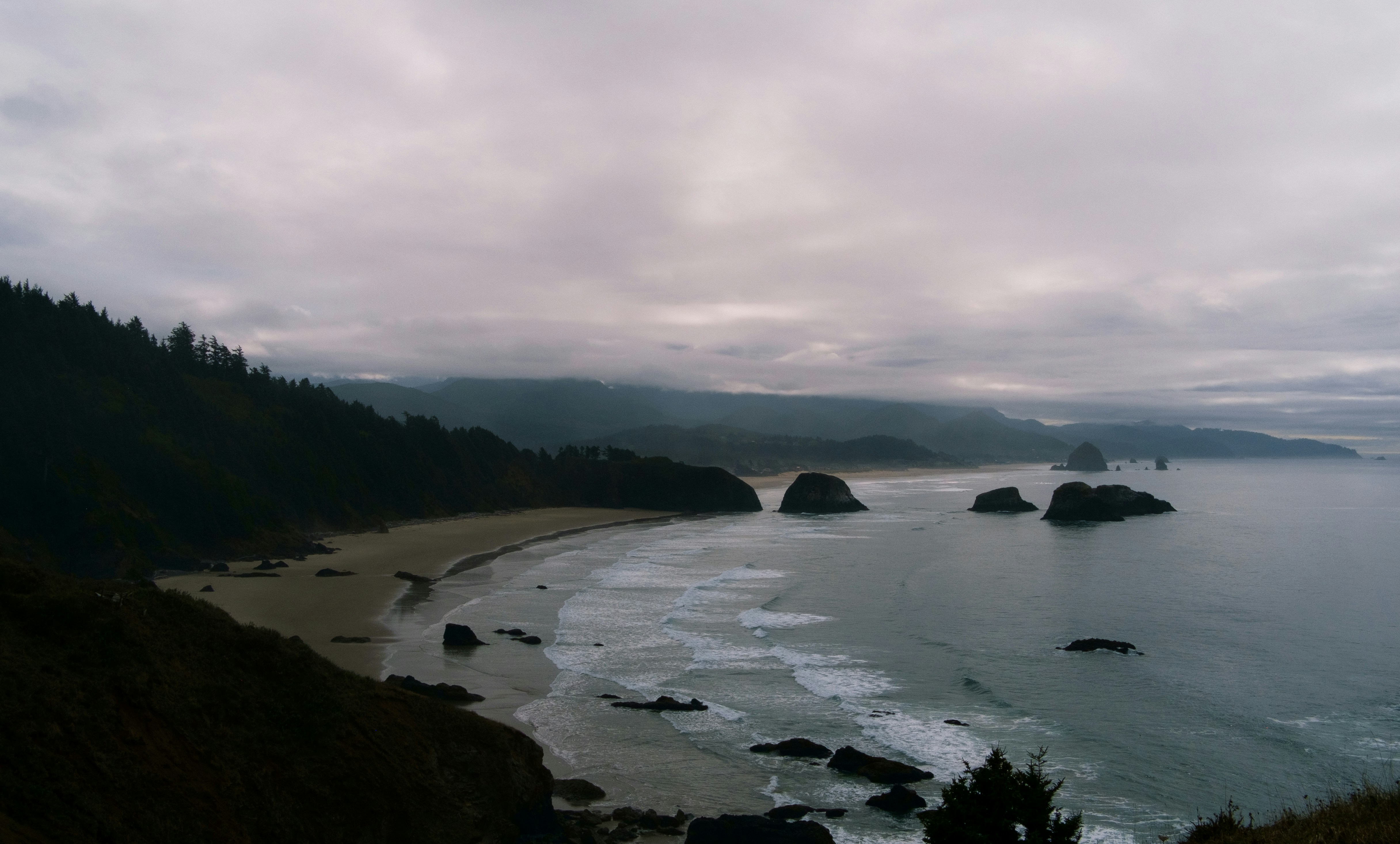 Sea Cliff Panorama: Rugged shoreline under a moody sky