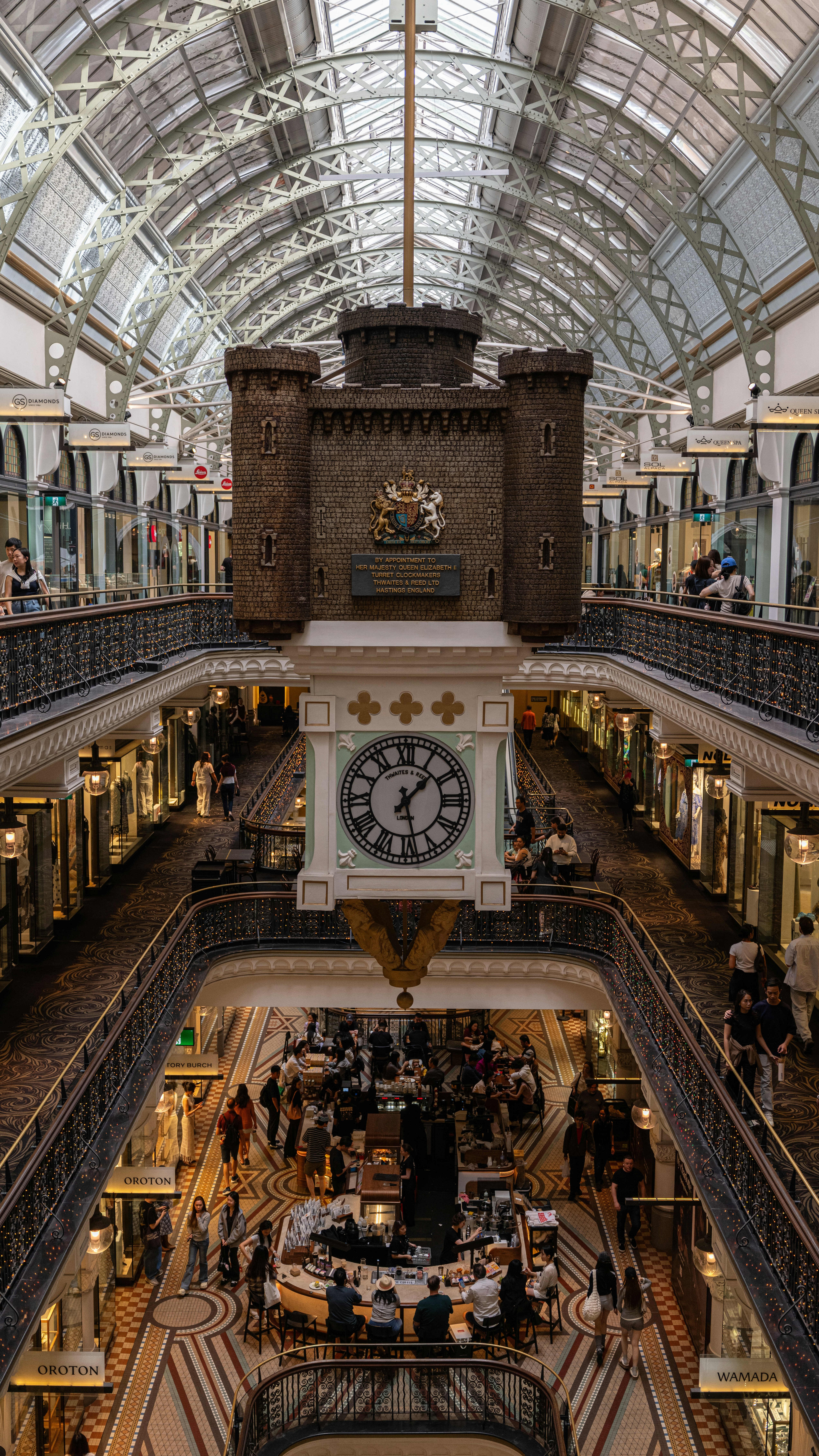 Timekeeper's Atrium: A Clocktower Dividing a Grand Shopperscape