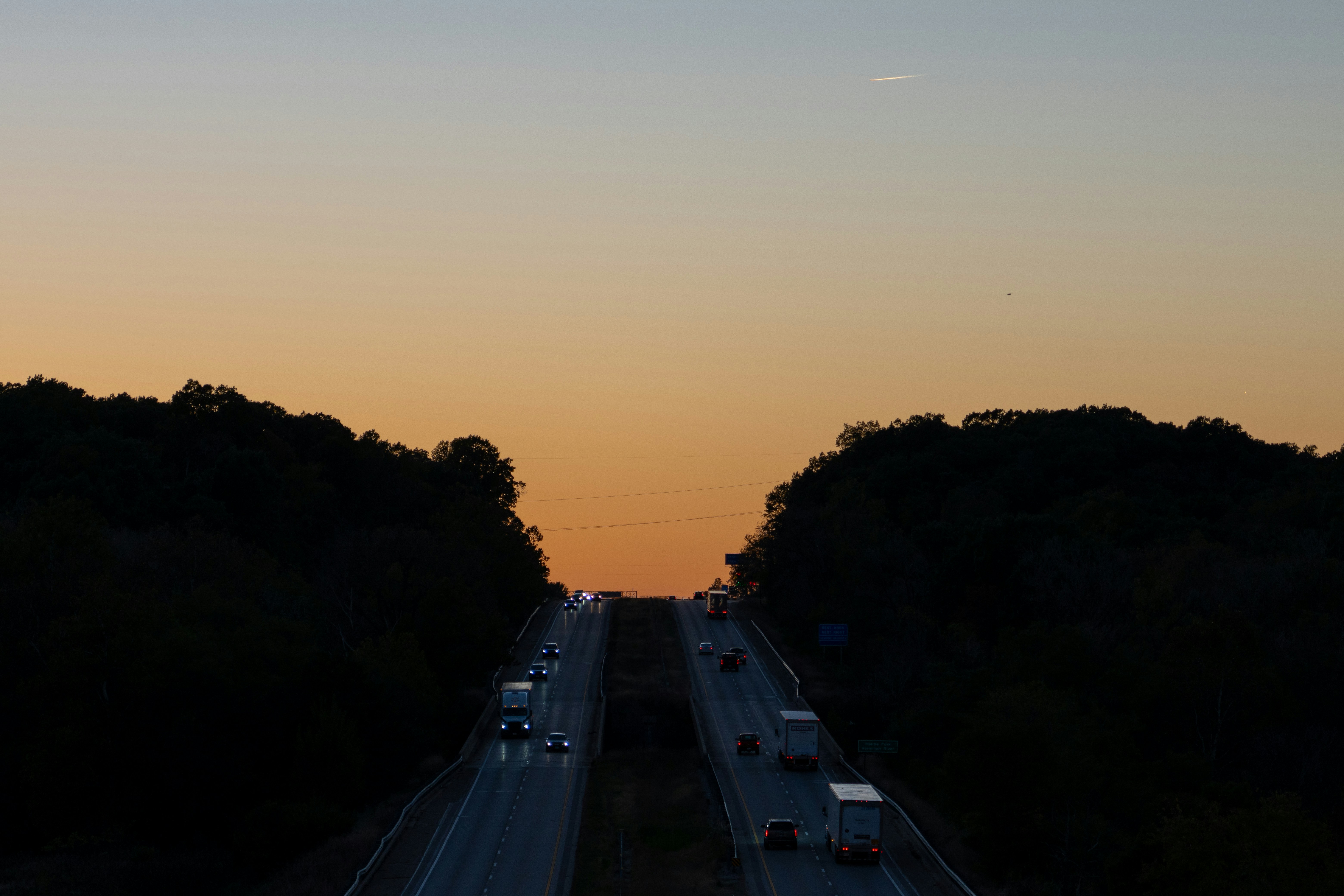 Dusk Horizon: A Quiet Toll of the Evening Highway