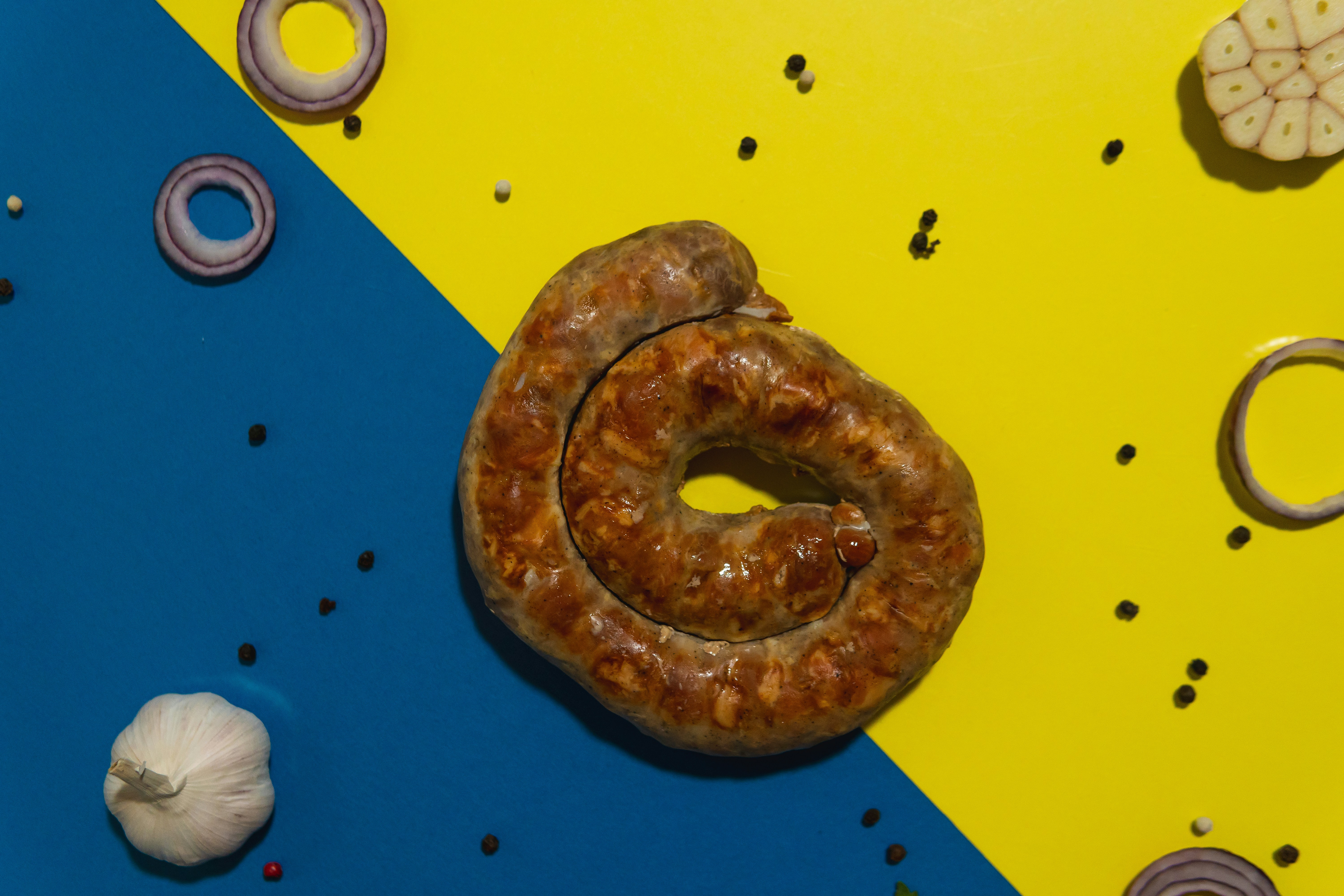 Coiled pastry centerpiece on a bold two-tone backdrop