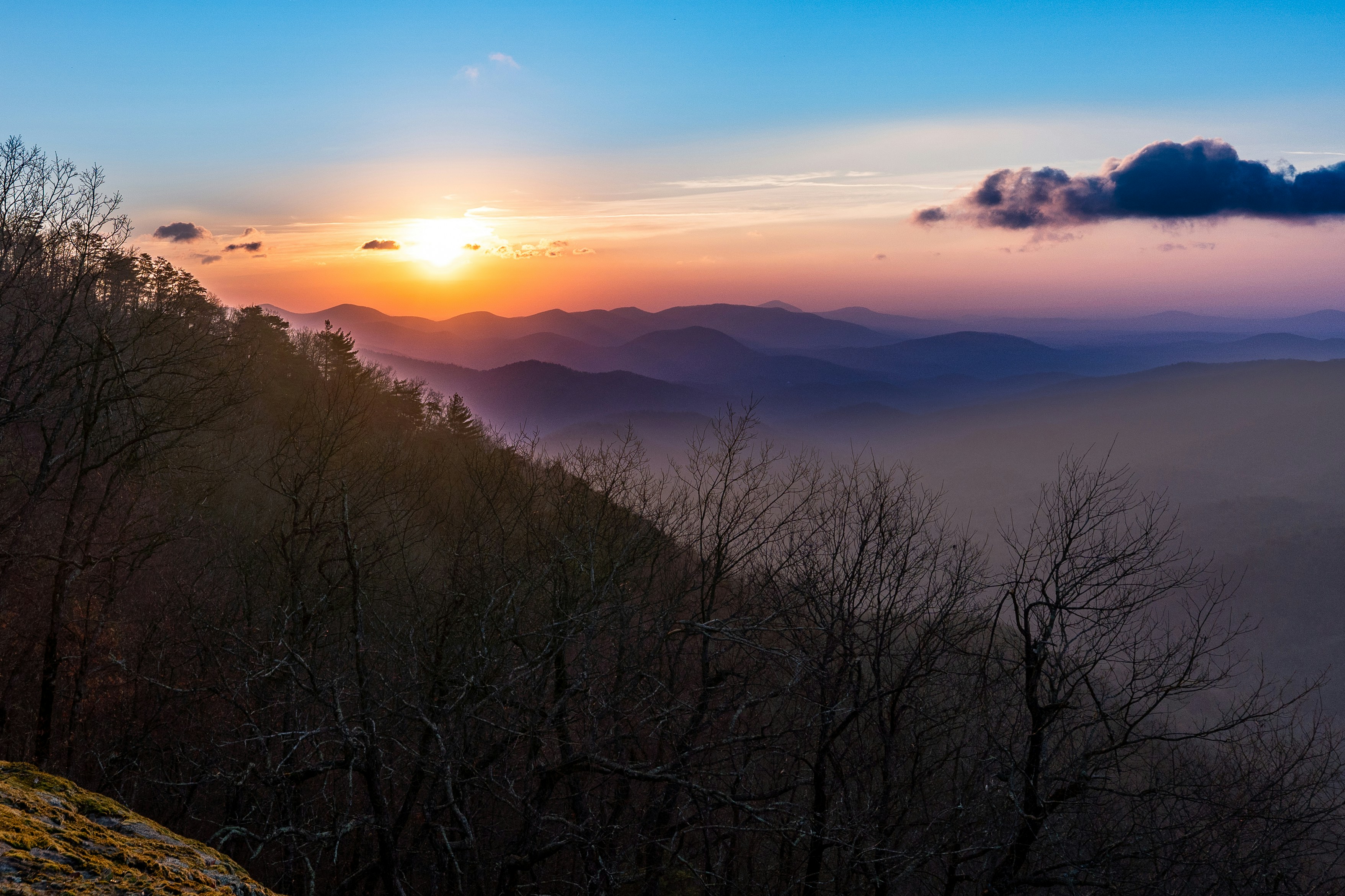 Sunrise Over the Misty Ridge: A Horizon of Hidden Valleys