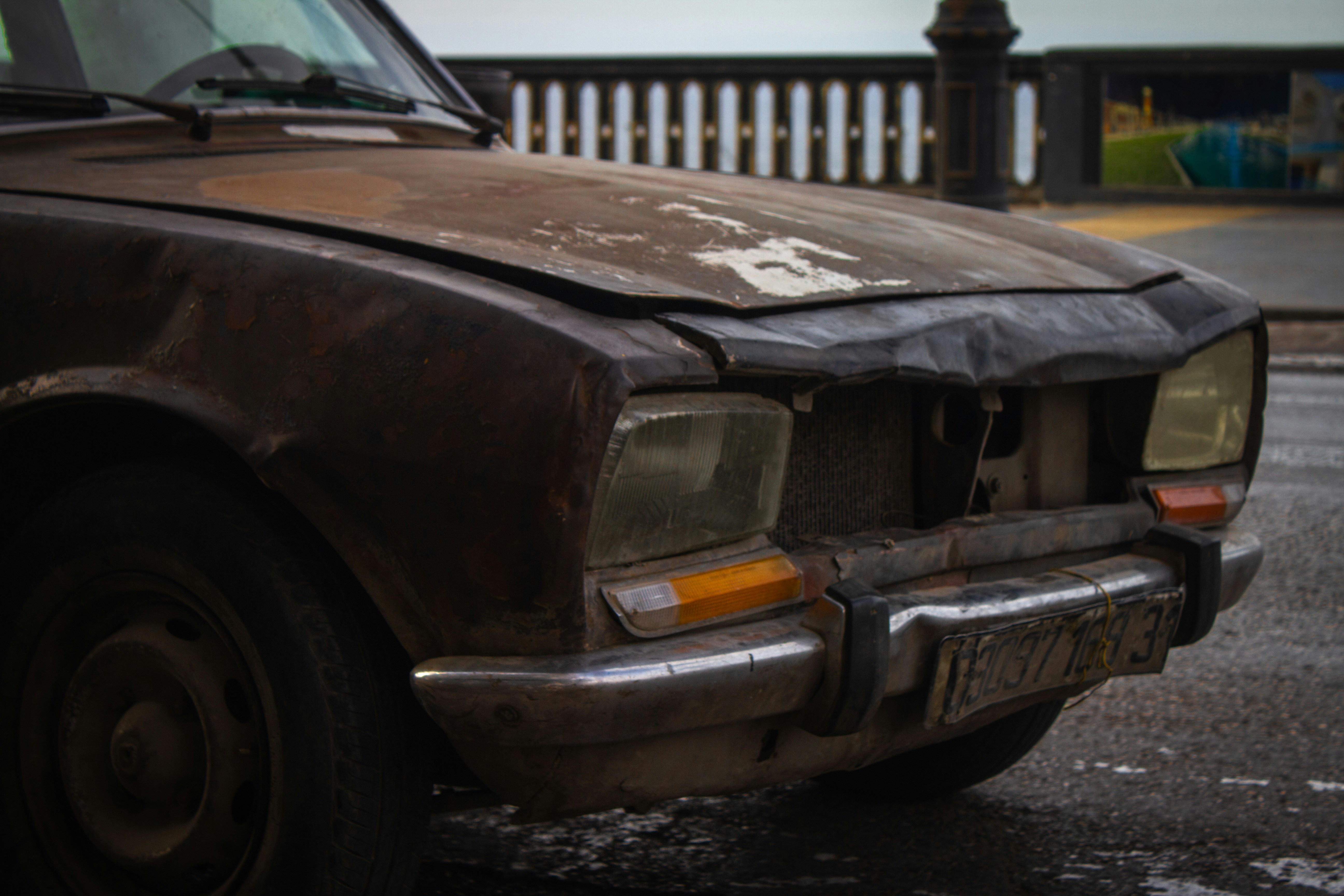 Rust and Resolve: The Weathered Front of a Classic Car