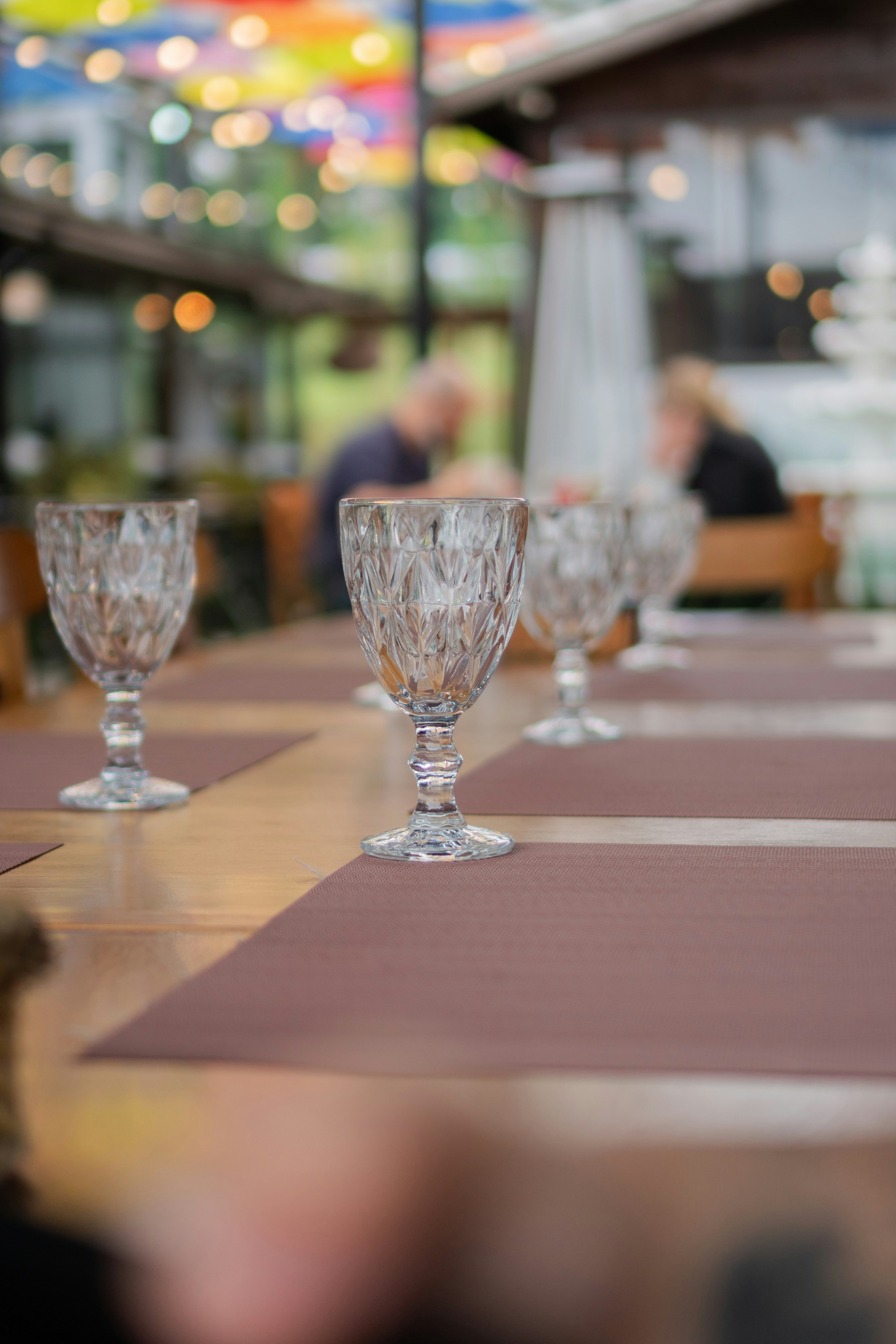 Crystal Glasses in a Quiet Bistro Moment