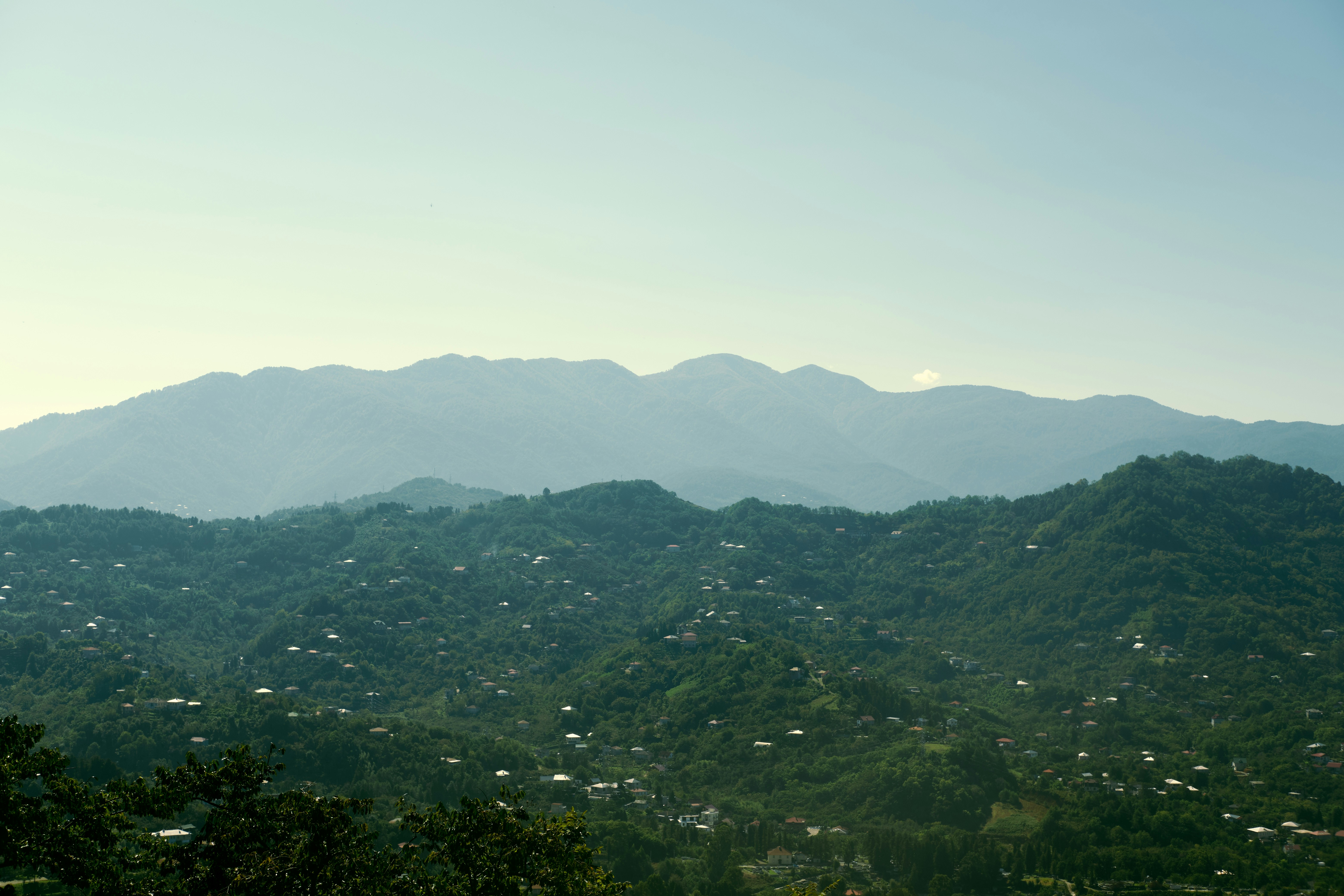 Horizon Ridge: Suburban Valleys Beneath Distant Peaks