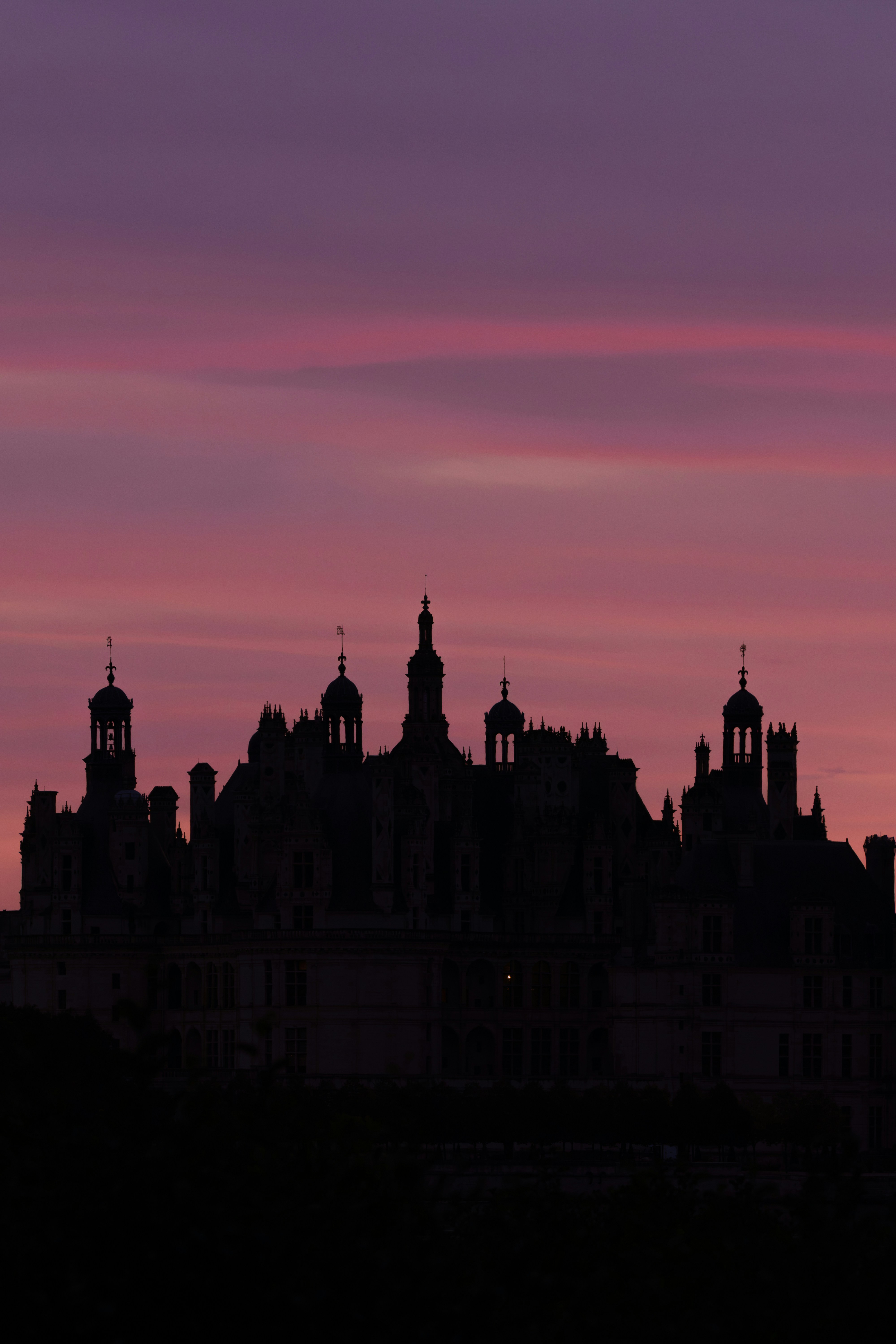 Silhouette of a Grand Historic Facade at Sunset