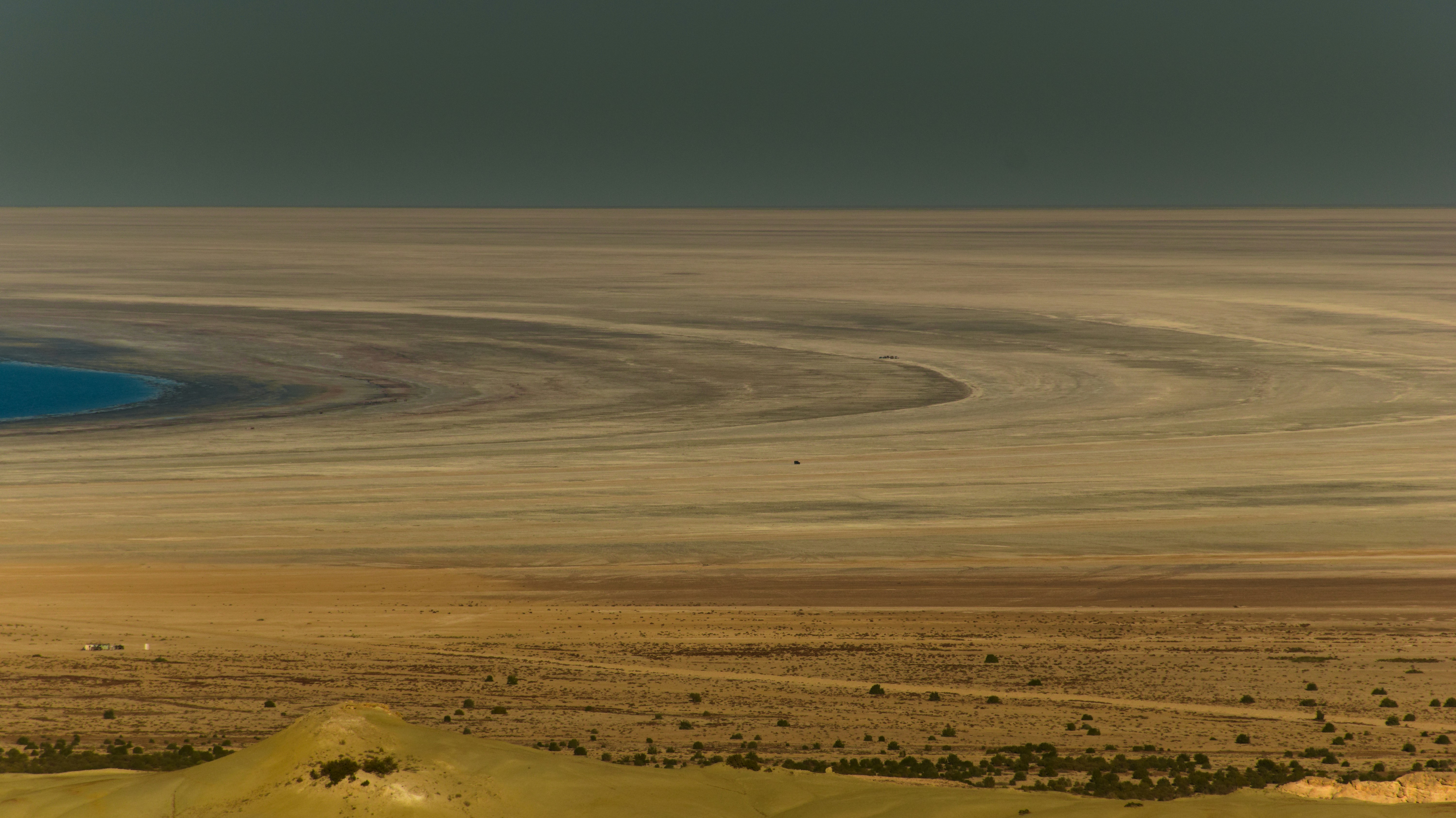 Desert Dunes Meet a Quiet Horizon