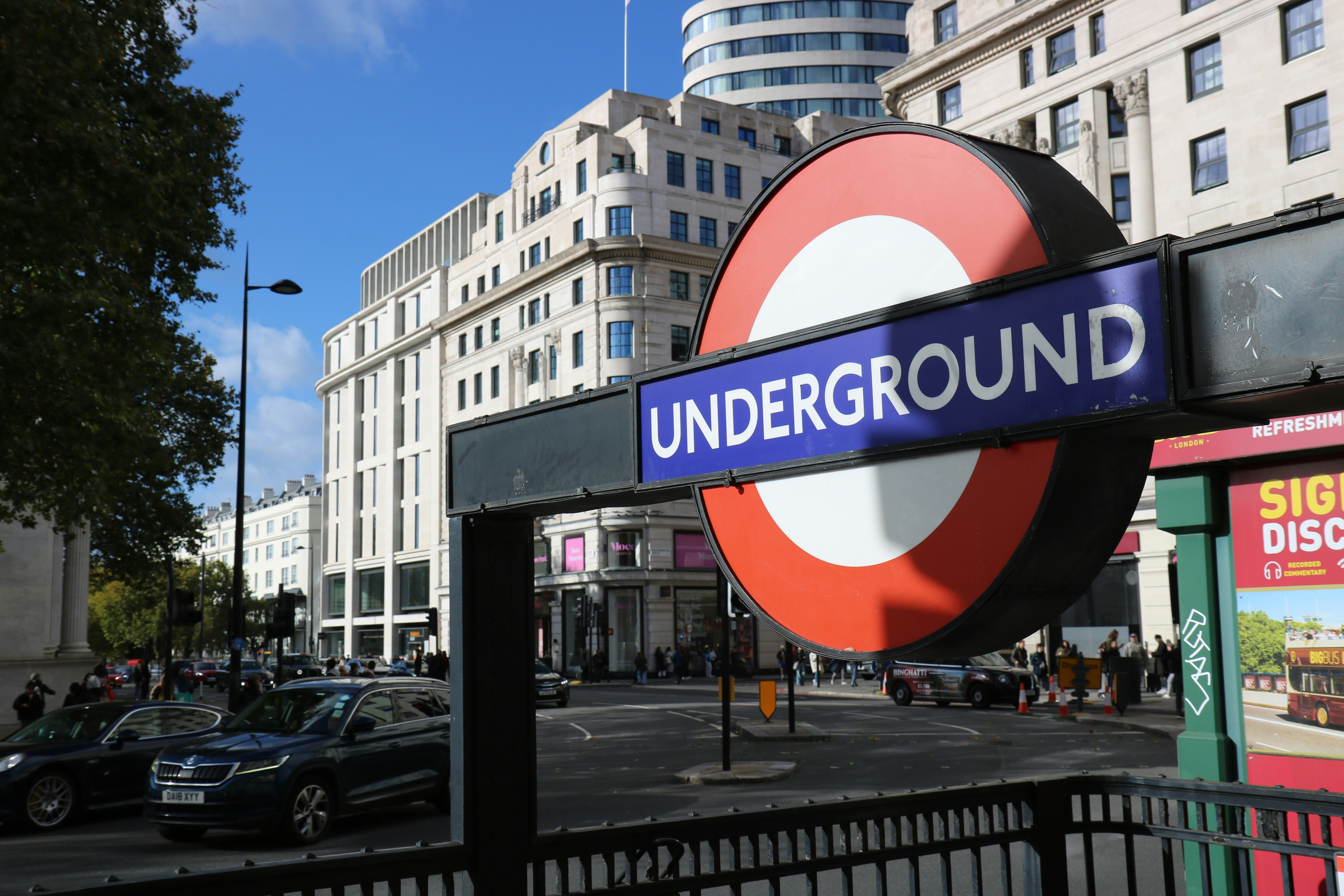 Underground Prominence: A London Street Scene Framed by the Circle