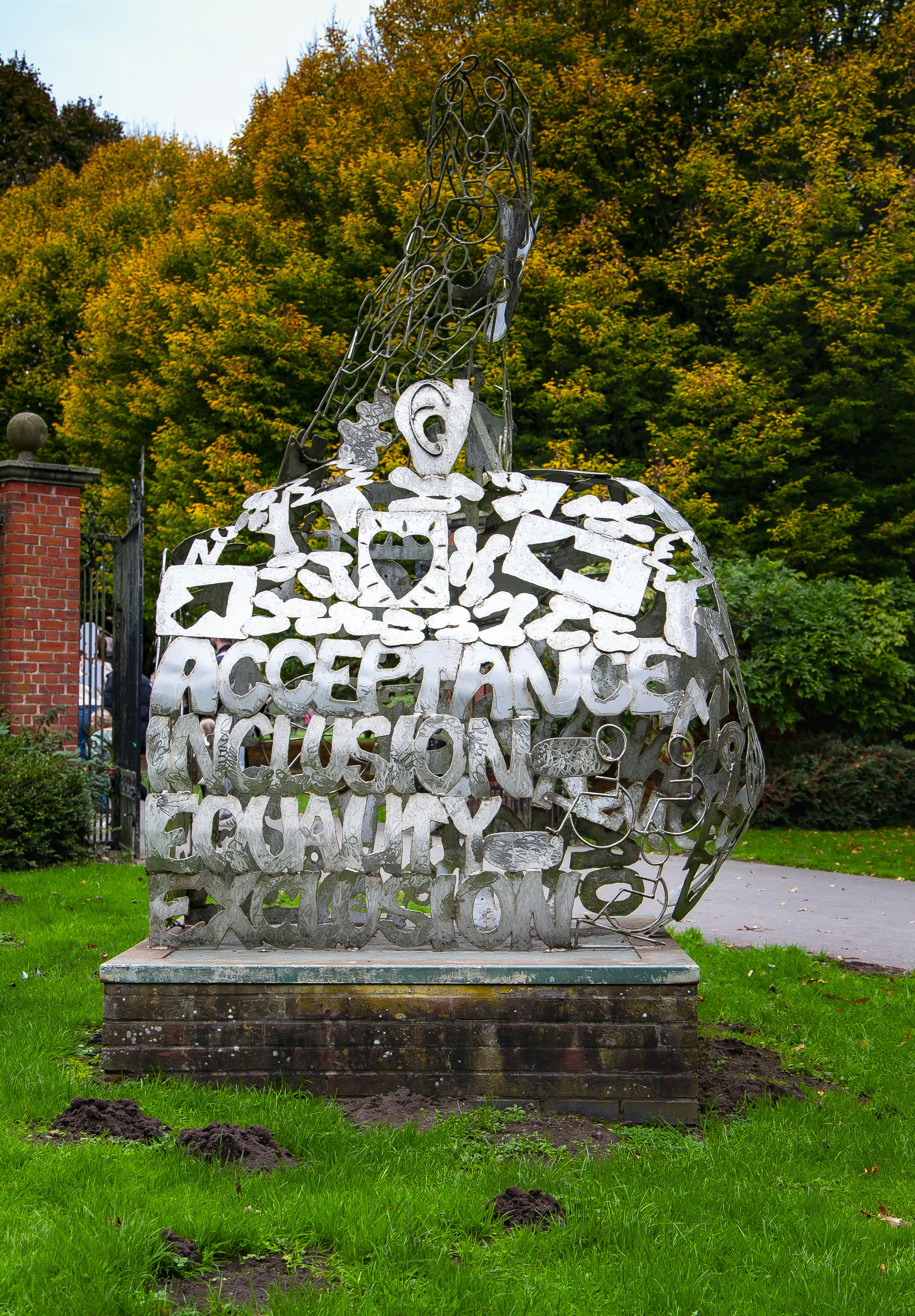Sculpted Heart of Inclusion: A Metal Portrait in the Park