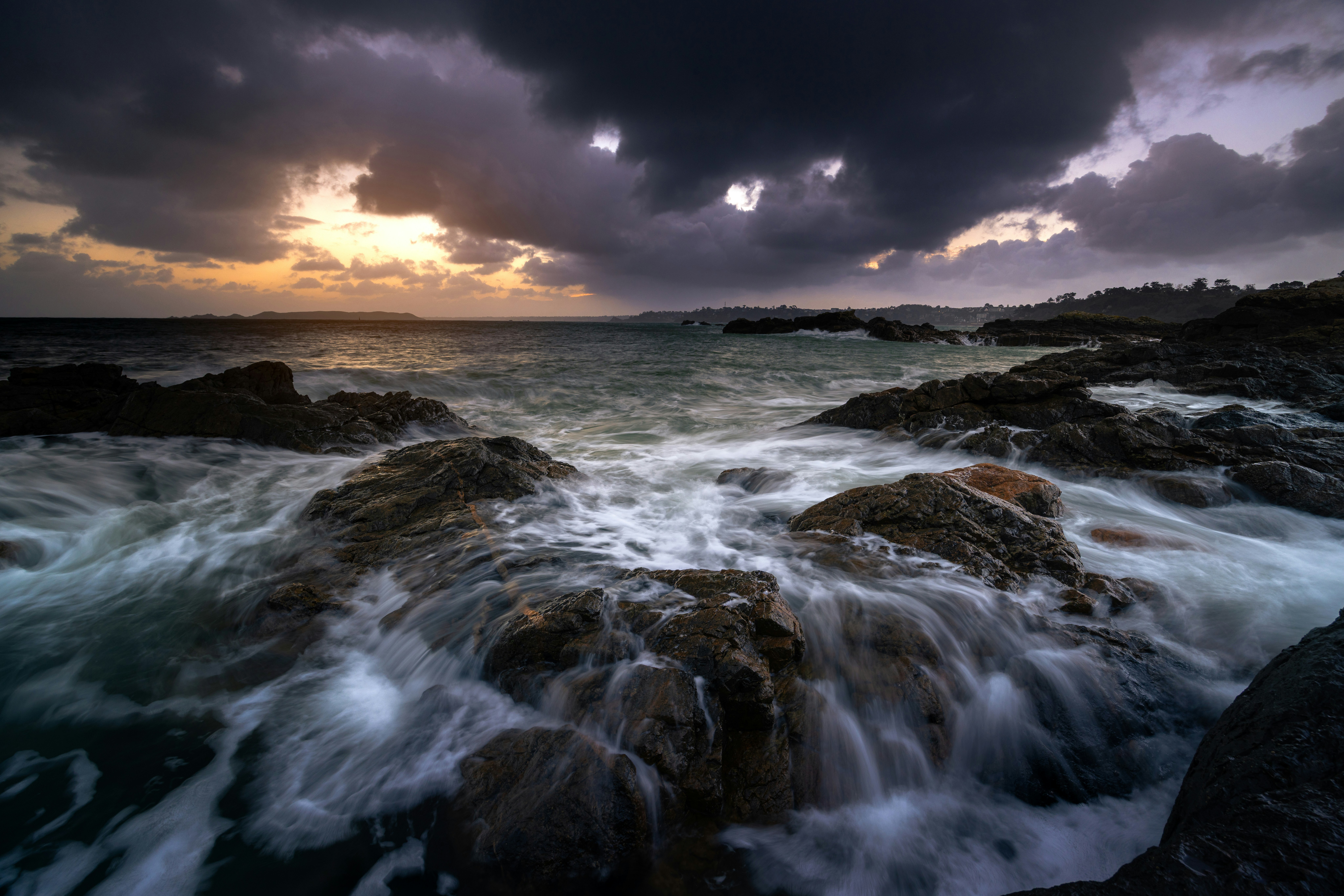 Storm-Whispered Tides Over Rugged Corals at Dusk